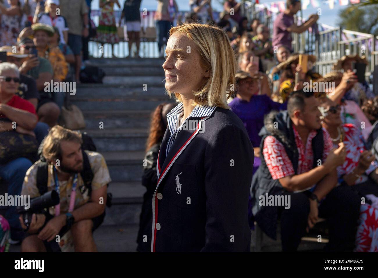 Caitlin Simmers of Team USA walks during an opening ceremony for the ...