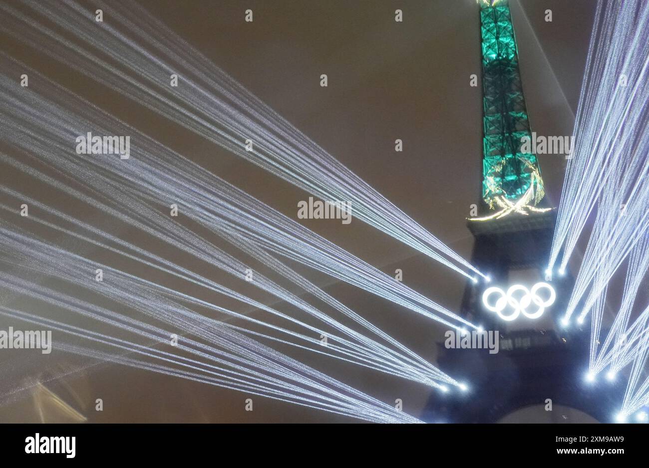 Paris, France. 26th July, 2024. A laser light show beams from the ...