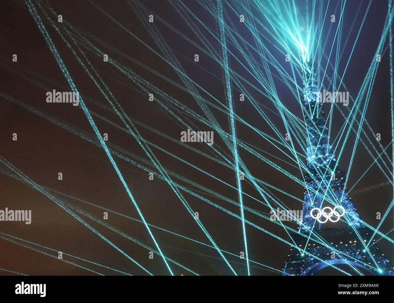 Paris, France. 26th July, 2024. A laser light show beams from the ...