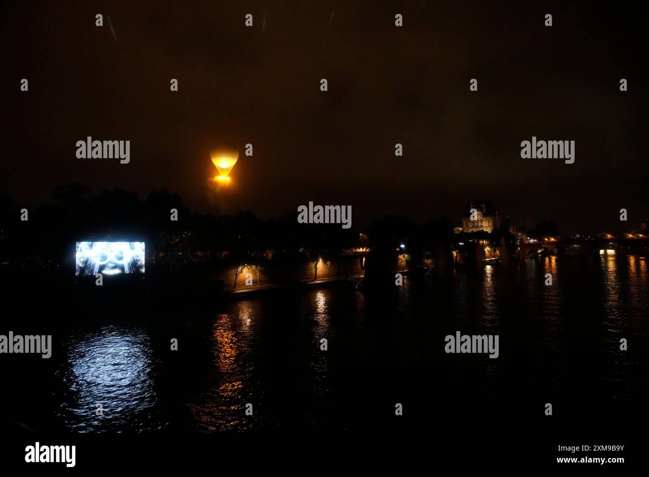 The cauldron rises in a balloon in Paris, France, during the opening ...
