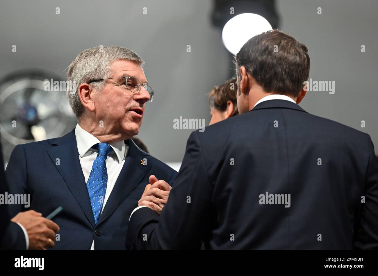 Emmanuel Macron, President of France, alongside Thomas Bach, President ...