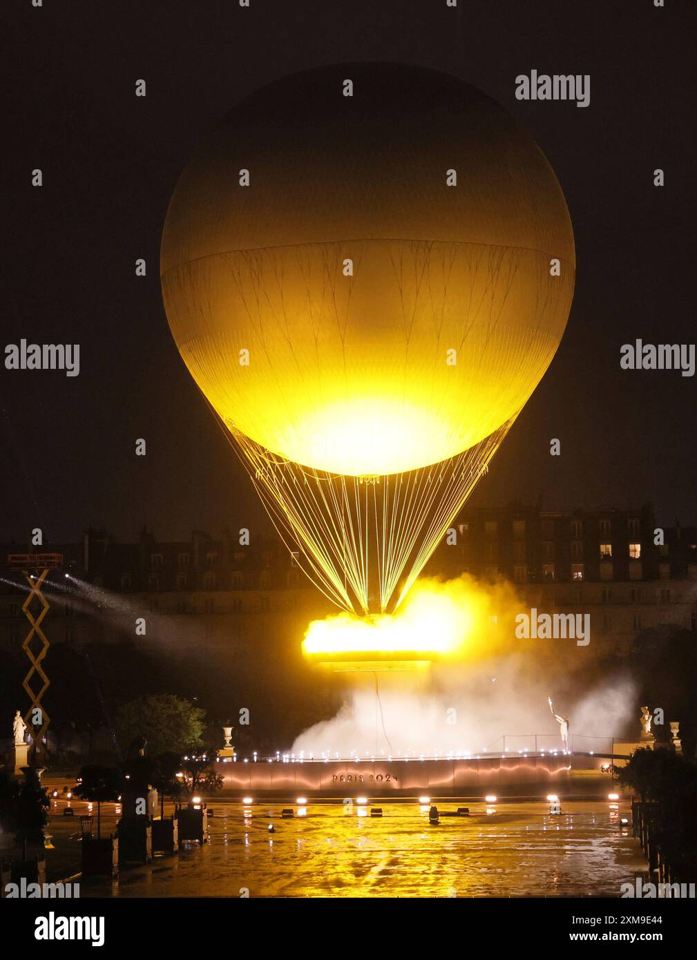 The Torch rises in the air during the opening ceremony for the Paris ...