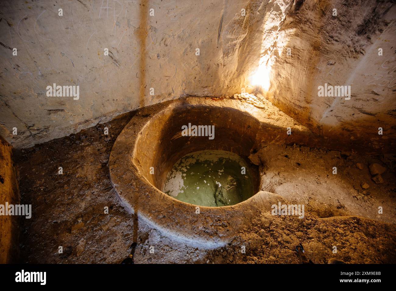 Old underground well in cave monastery, Migulinskaya cave Stock Photo ...