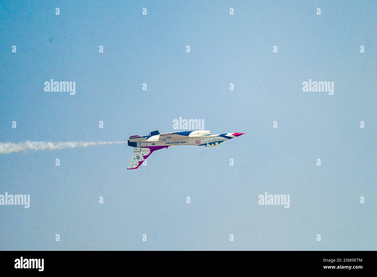 A U.S. Air Force Thunderbirds preforms an inverted maneuver during the ...