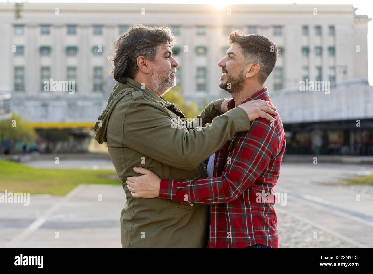Two married men who are in love are embracing each other Stock Photo ...