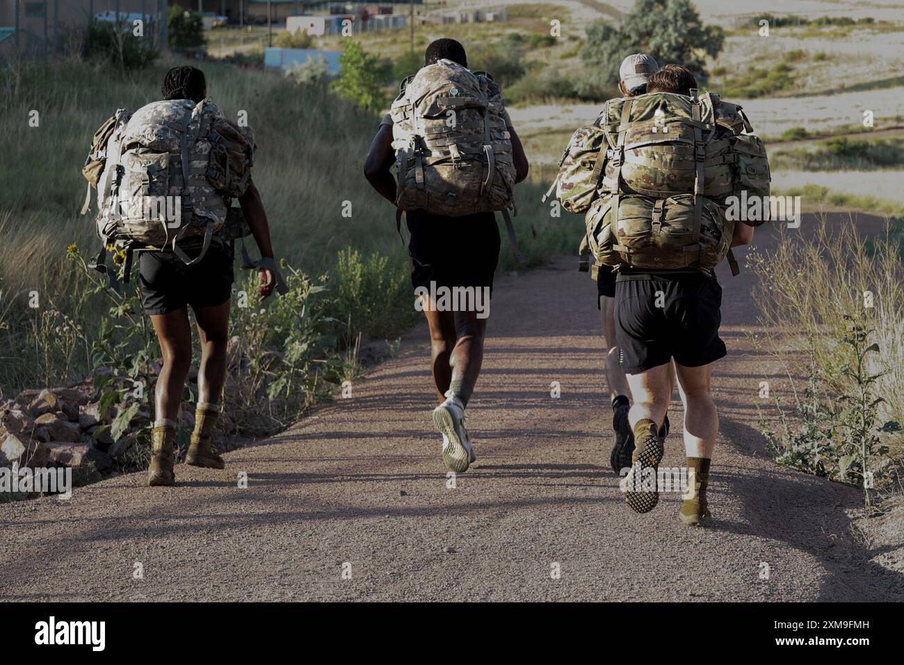Originals from 10th Special Forces Group (Airborne) begin a three-mile ...