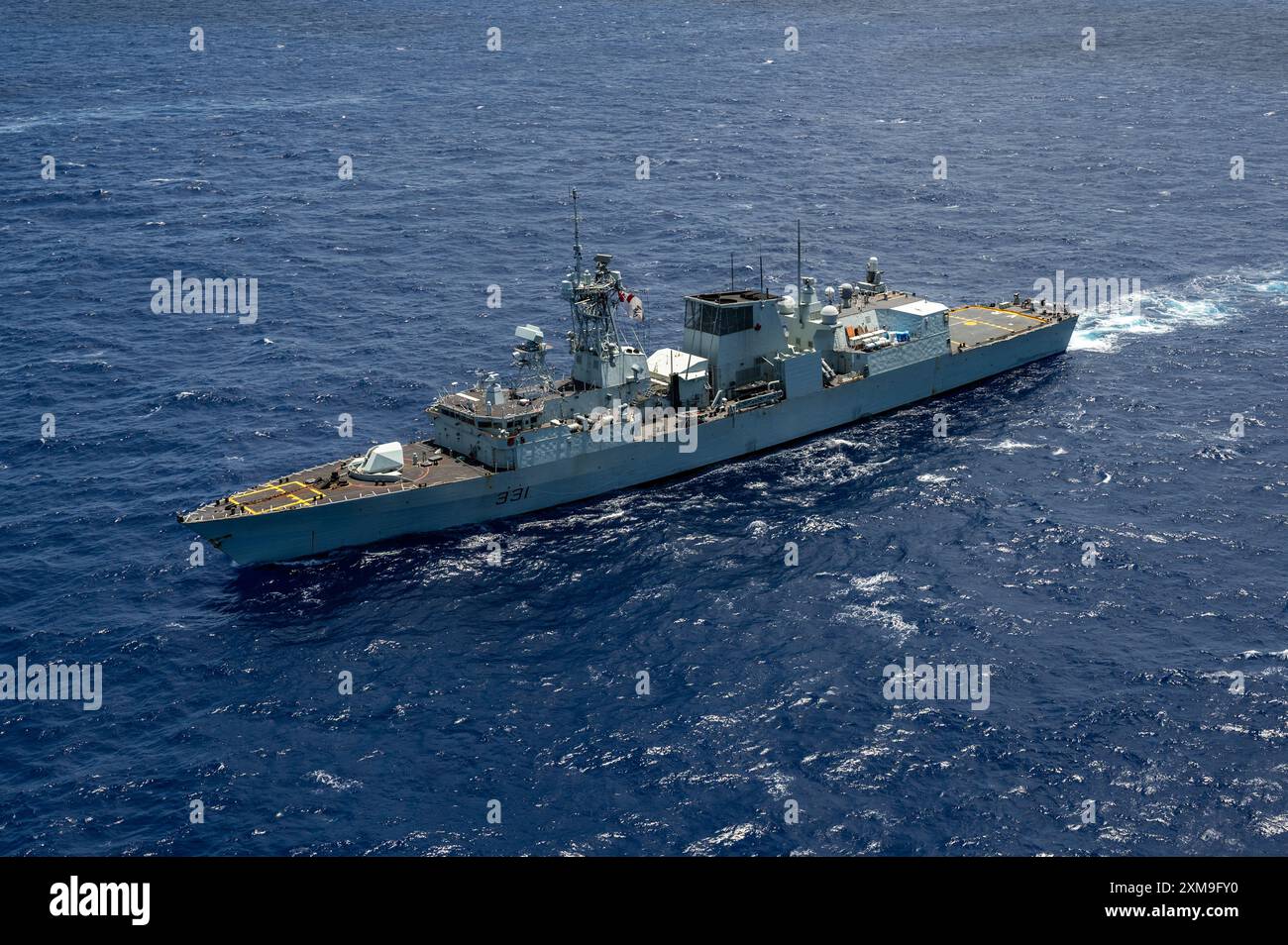 Royal Canadian Navy frigate HMCS Vancouver (FFH 331) sails in formation ...