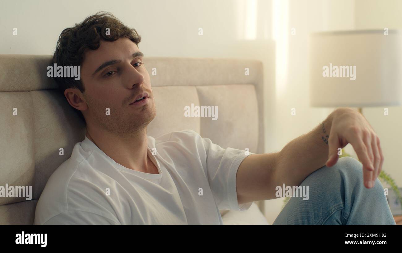 Tired exhausted young man sighing hi-res stock photography and images ...