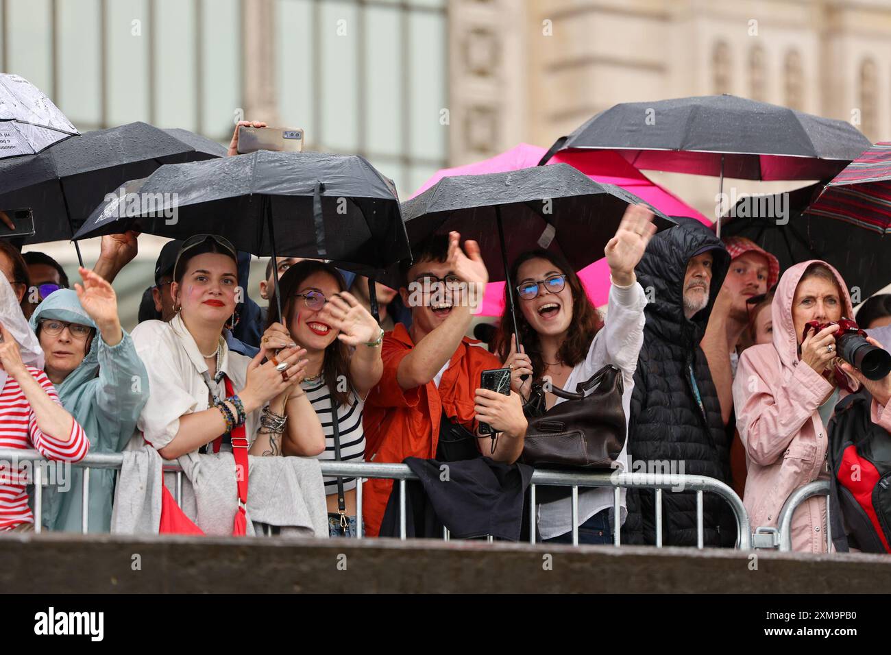 Paris, Ile de France, France. 26th July, 2024. Spectator wave to ...