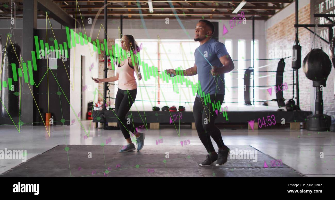 Jumping rope in gym, fitness data analysis image over athletes Stock ...