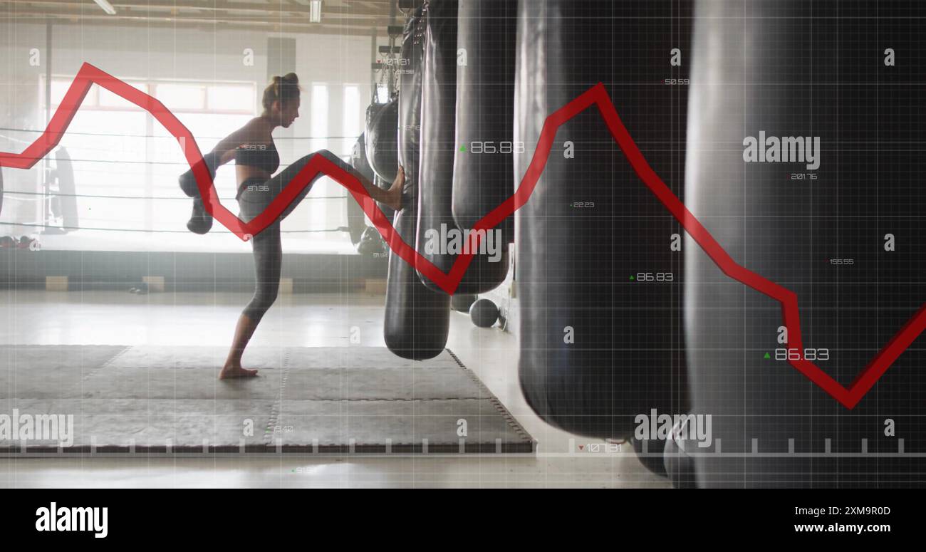 Boxing in gym, woman training with punching bag over financial graph ...