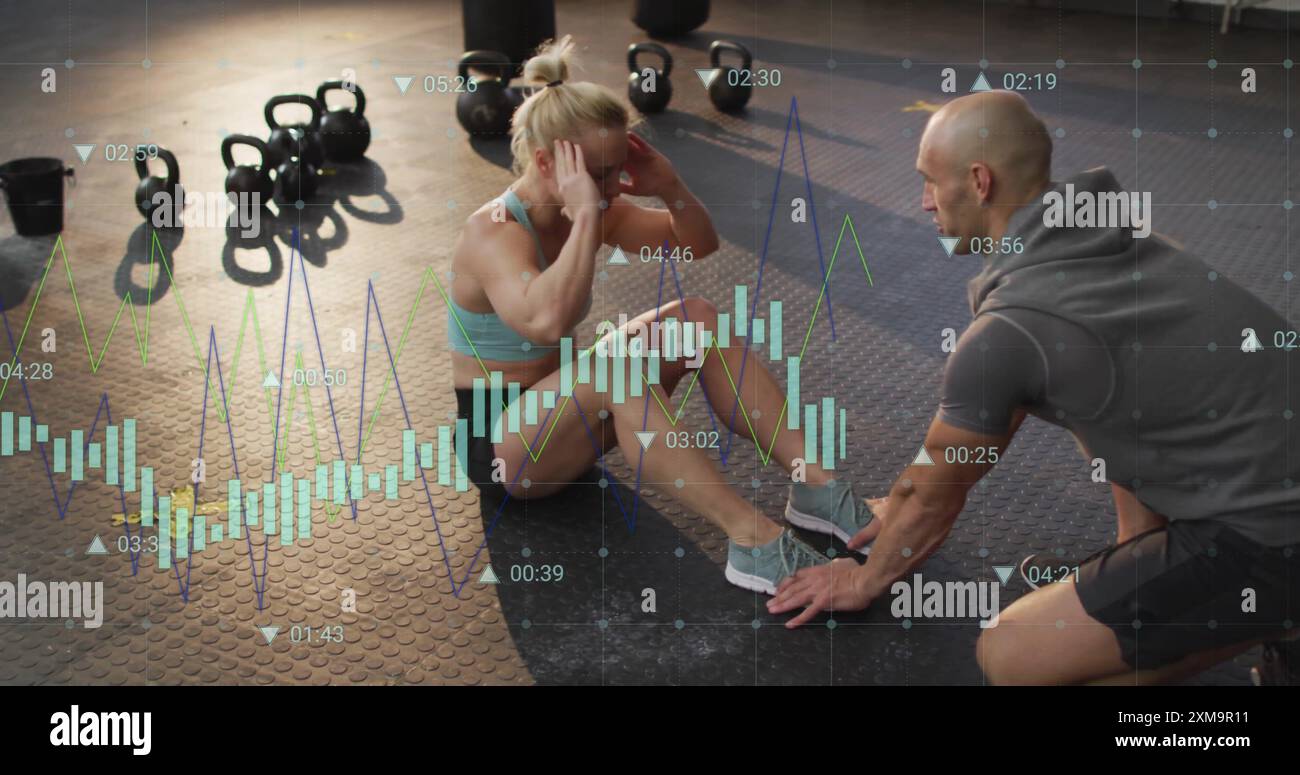Fitness data tracking image over people exercising in gym Stock Photo ...