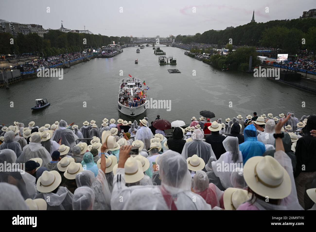 Paris, France. 26th July, 2024. Boats carrying members of delegations ...