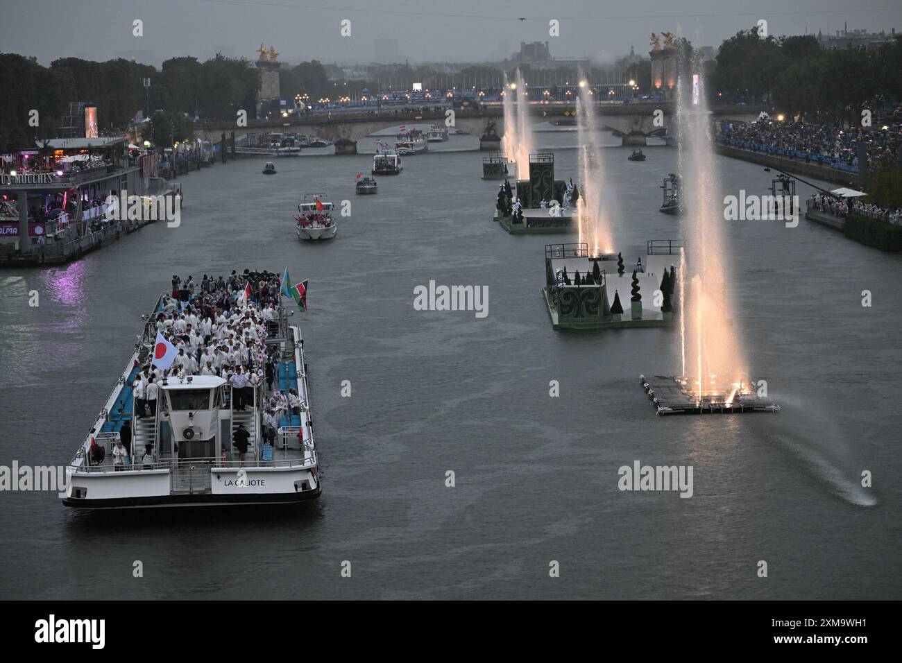 Paris, France. 26th July, 2024. Boats carrying members of delegations ...