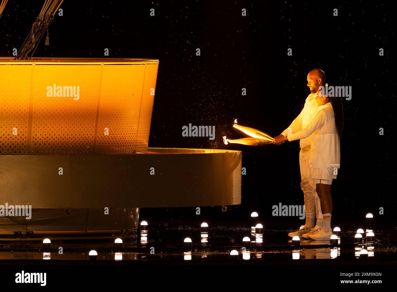 Paris, France. 27th July, 2024. Lighting of the Olympic flame by Teddy ...
