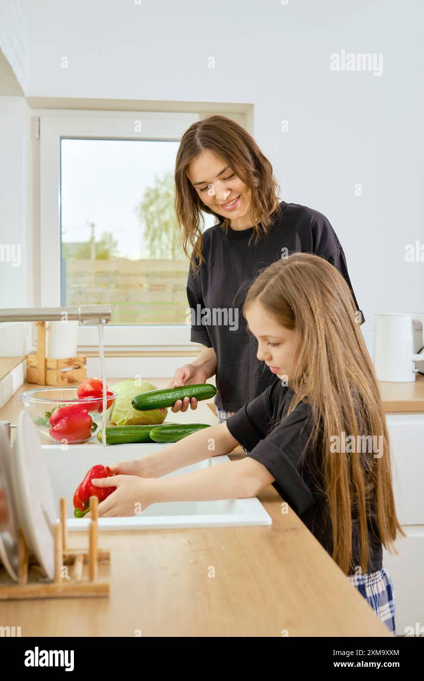 Mother explains daughter importance hi-res stock photography and images ...
