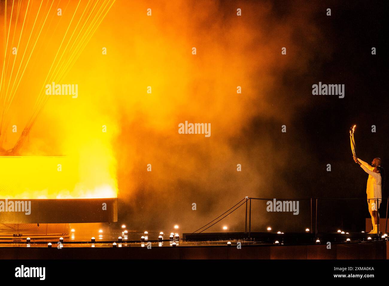 Paris, France. 27th July, 2024. Lighting of the Olympic flame by Teddy ...