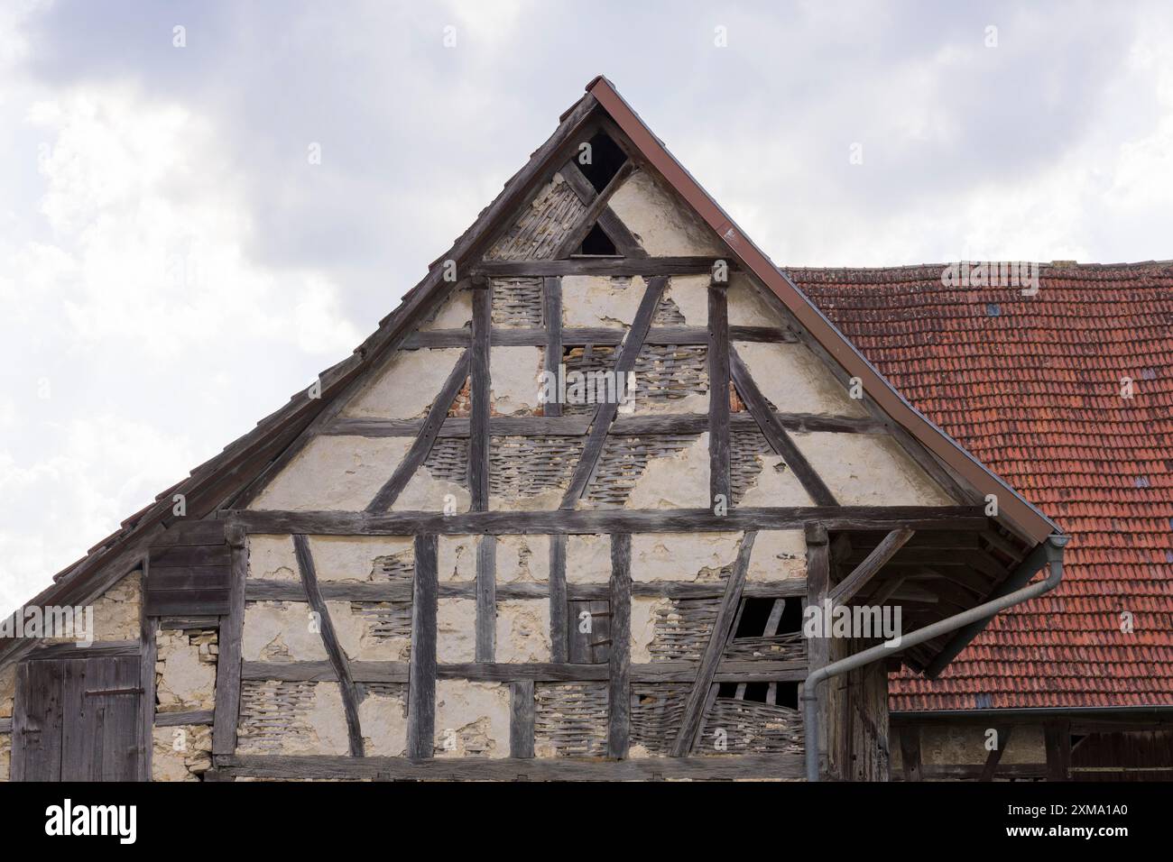 Old historic half-timbered house, gable, facade, in need of renovation ...