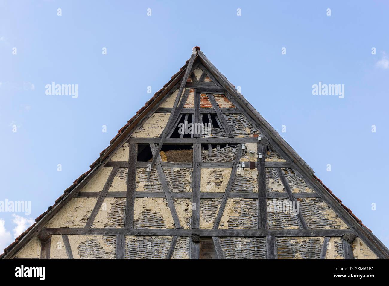 Old historic half-timbered house, gable, facade, in need of renovation ...