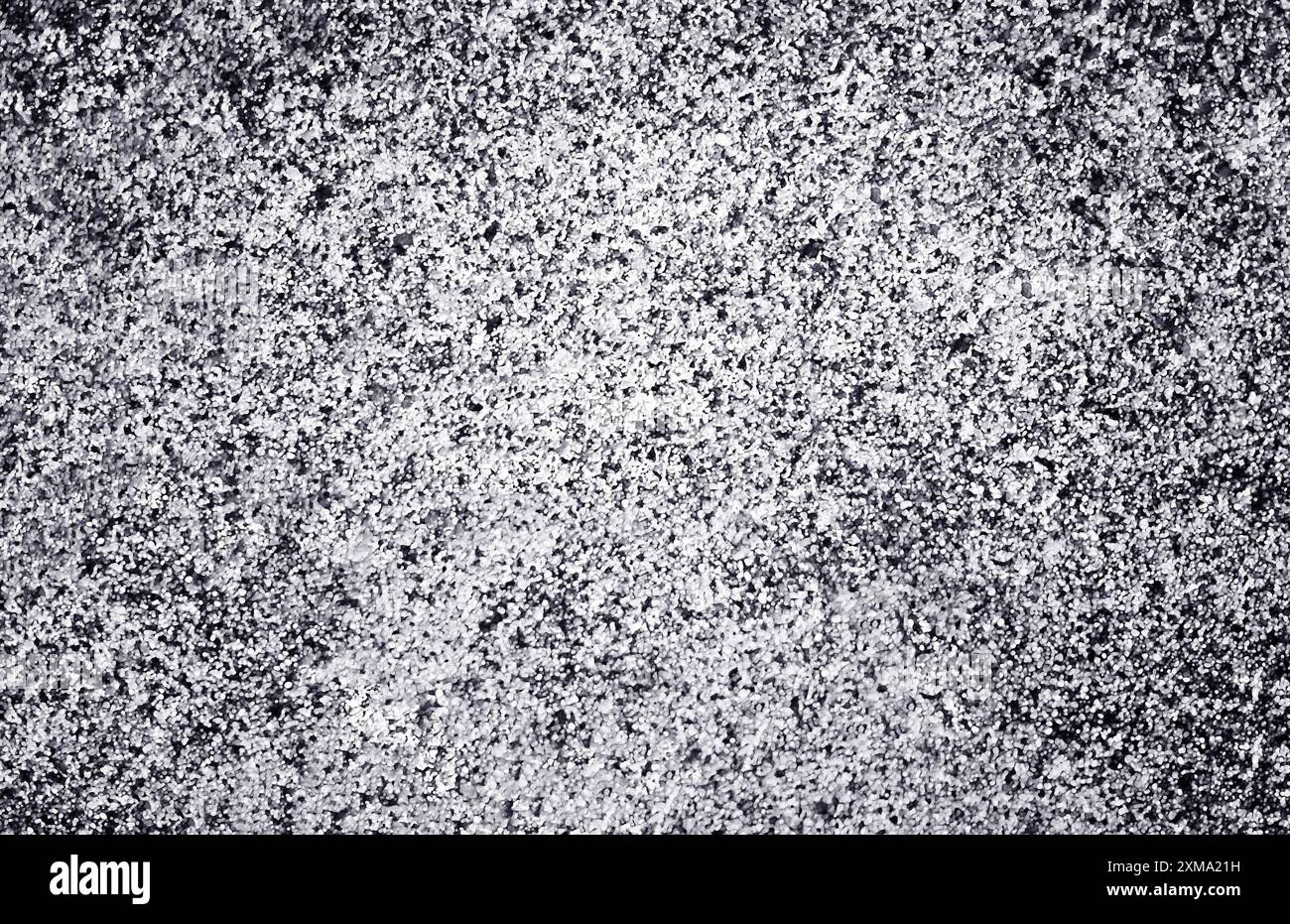 An abstract pattern of black and white static noise resembling old ...