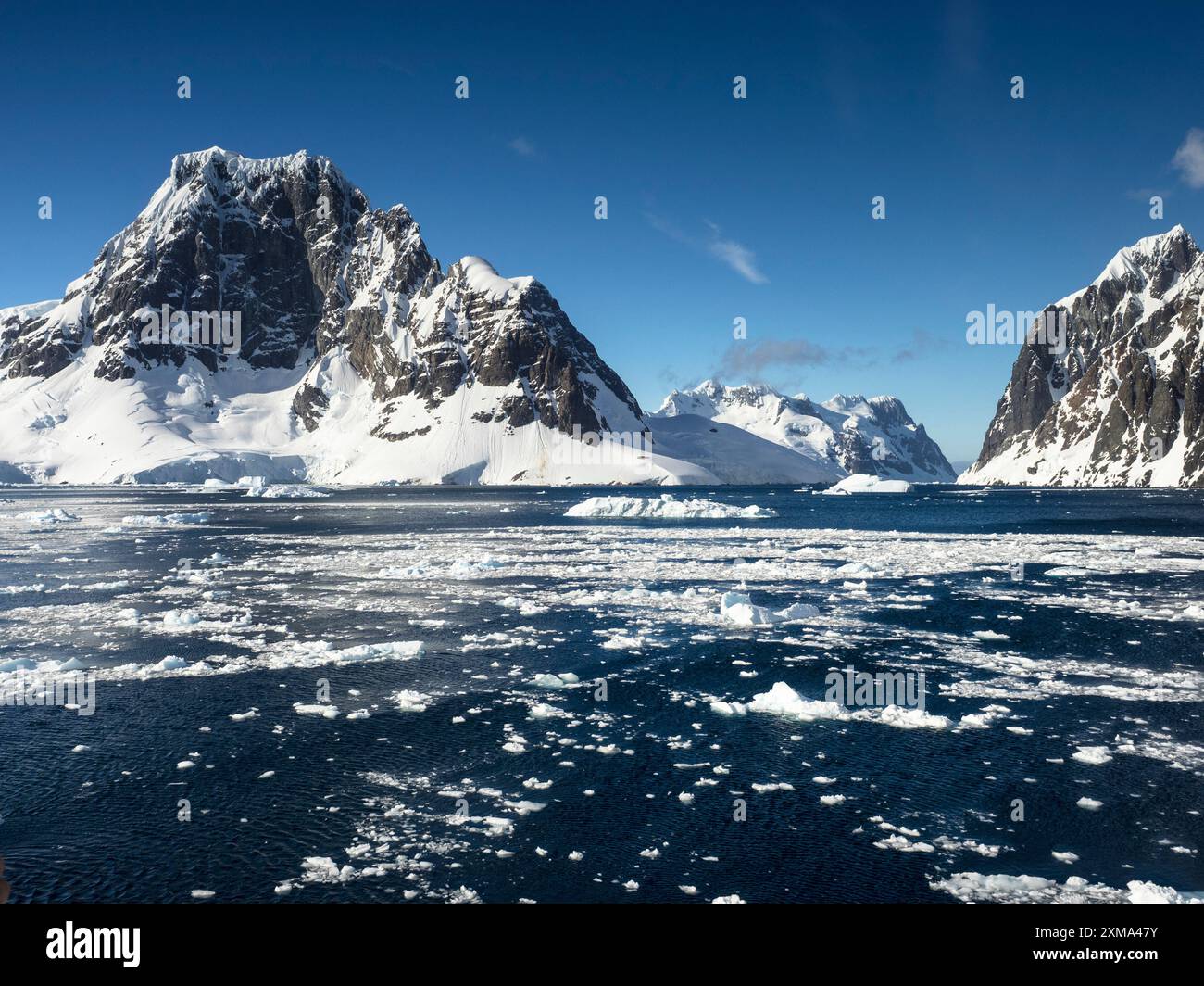 Drift (Brash) ice below Mount Cloos (l), northern entrance to Lemaire ...