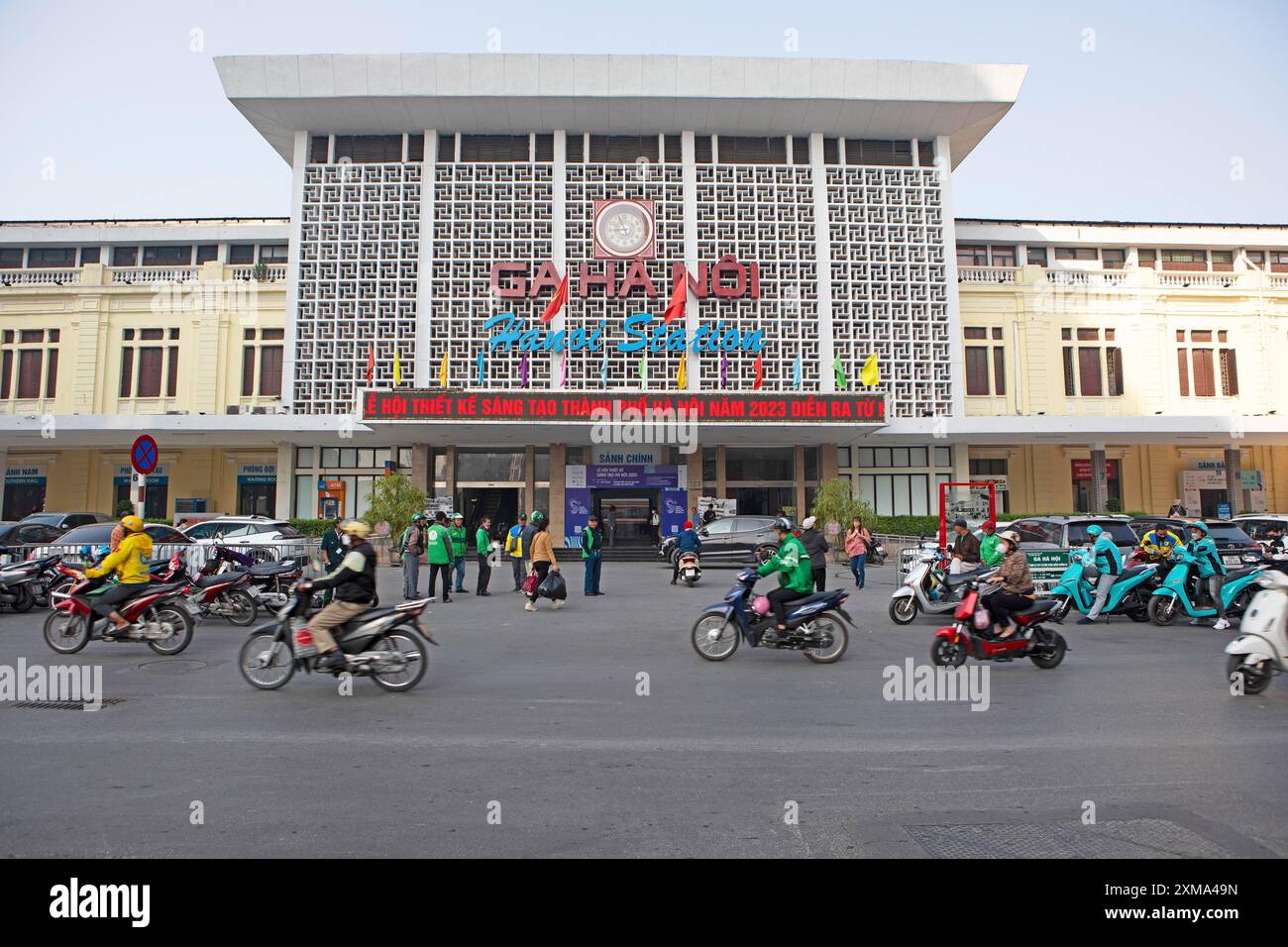 Moped rider at Hanoi railway station, Vietnam Stock Photo - Alamy