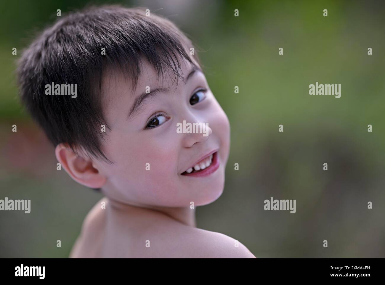 Child, boy, 5 years, portrait, multiethnic, from behind, smiles, laughs ...