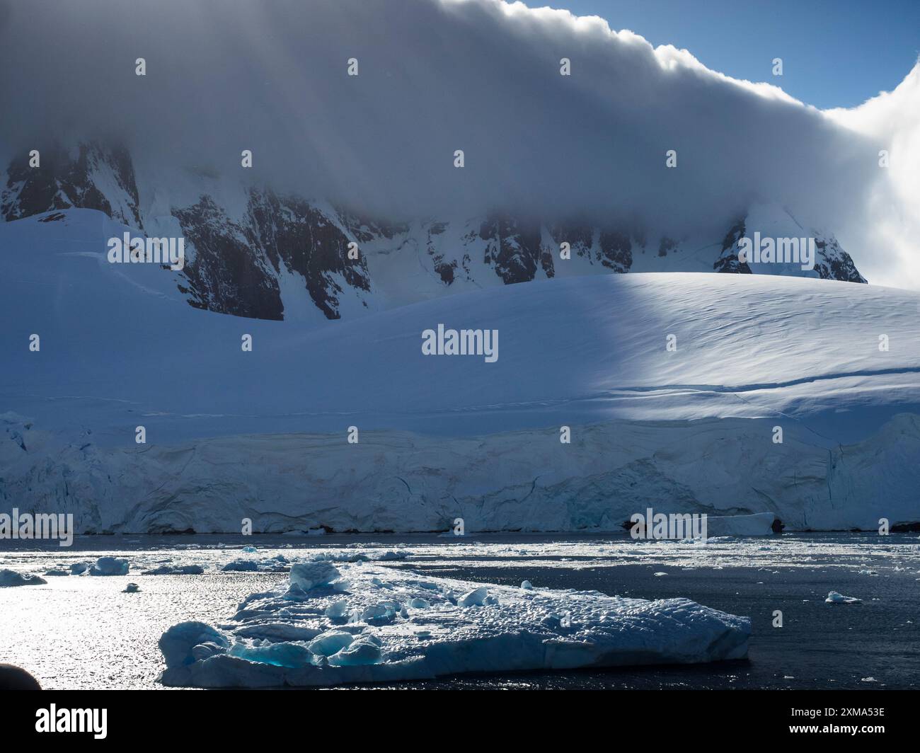 Drift (Brash) ice in the Lemaire Channel below the cloud-shrouded ...