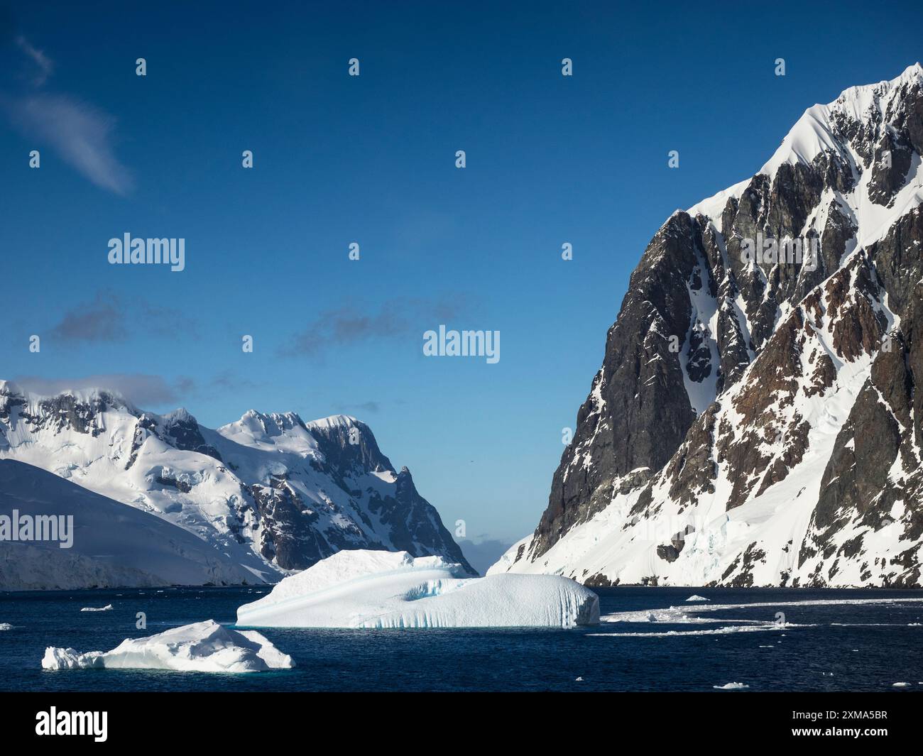 icenergs below Wandel Peak at the northern entrance to the Lemaire ...