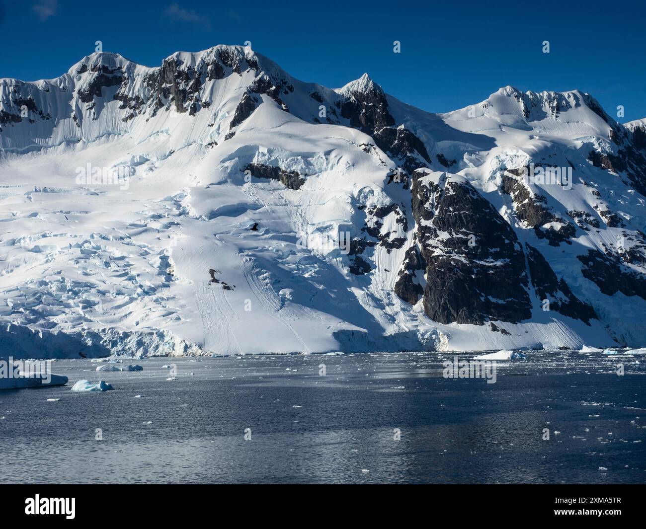 Glacier on the Graham Land Coast above the Lemaire Channel between ...