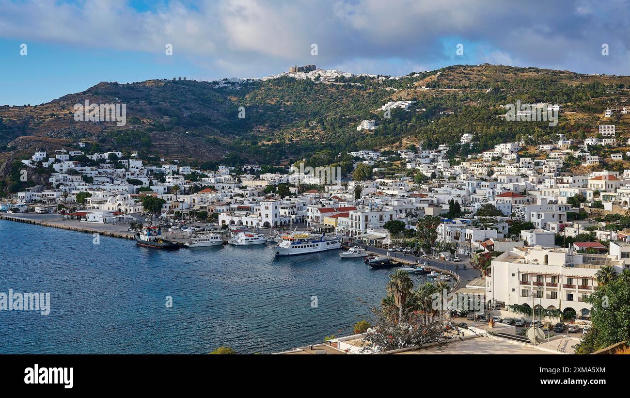 Panoramic view of a coastal town on a Greek island with white buildings ...