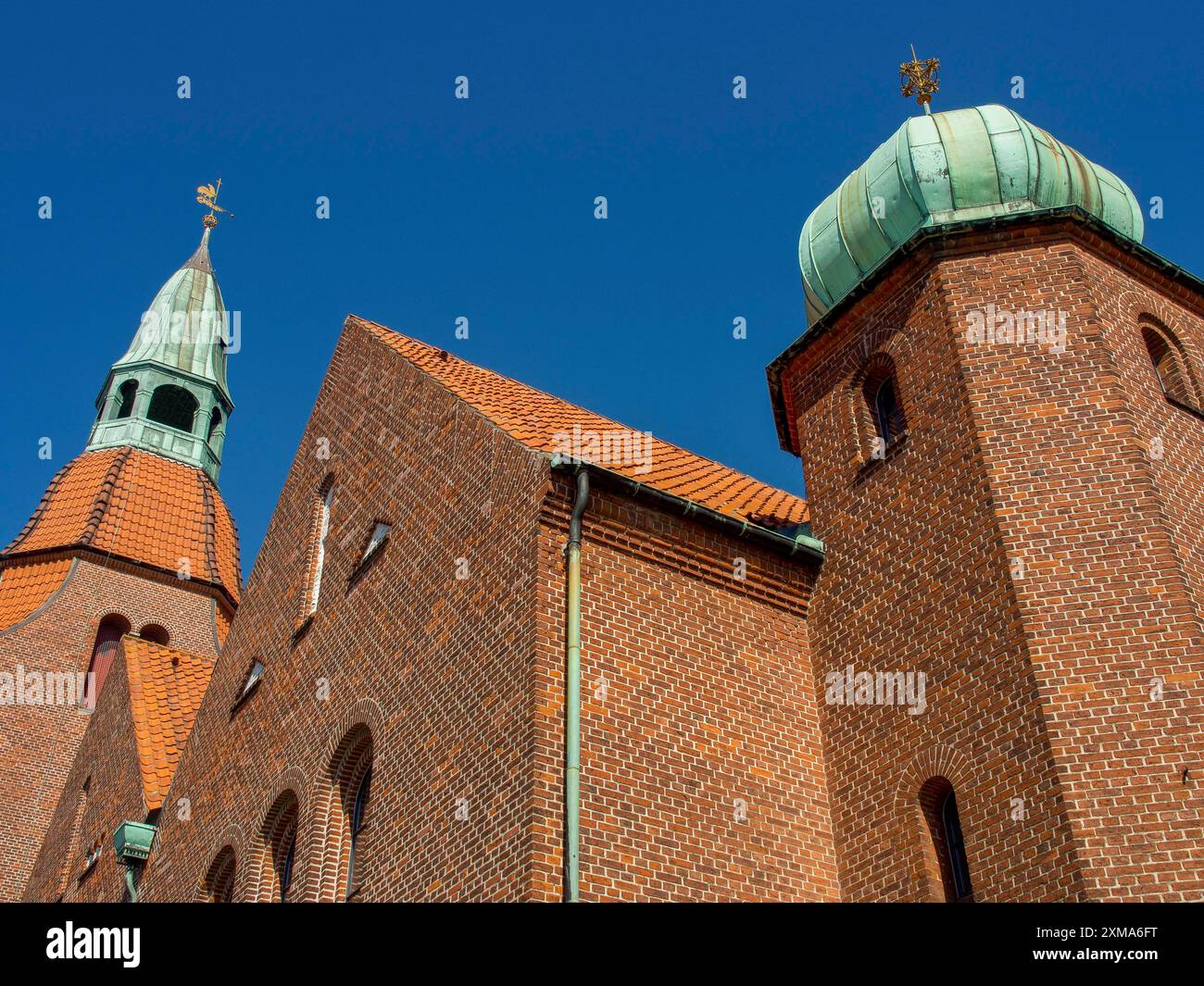 Background two church towers hi-res stock photography and images - Alamy