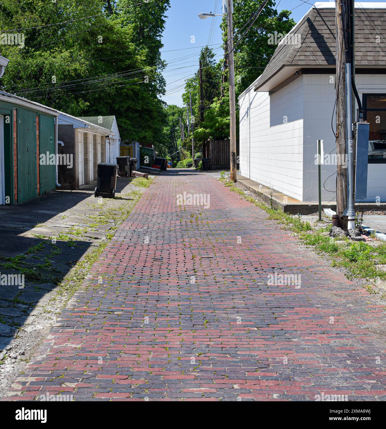 Century old brick alley way between buildings in city Stock Photo - Alamy