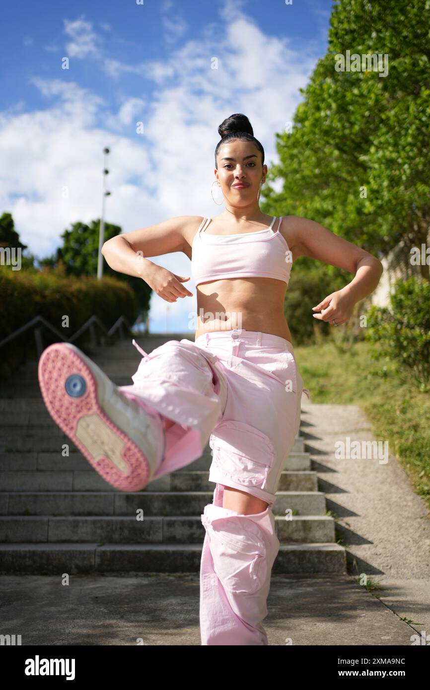 One foot up pose hi-res stock photography and images - Alamy