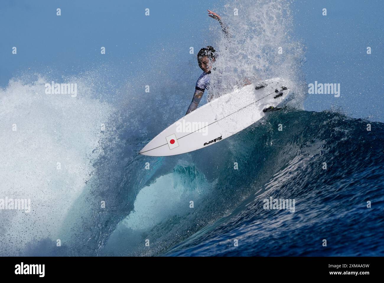Shino Matsuda, of Japan, surfs during a training session ahead of the ...