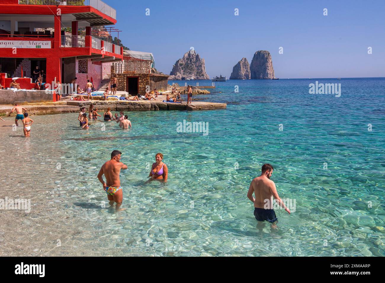 Marina Piccola bay on the south coast with the Faraglioni rocks, the ...