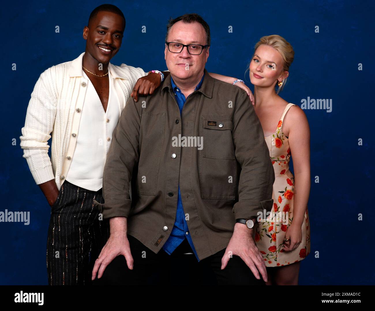 Ncuti Gatwa, from left, Russell T Davies, and Millie Gibson pose for a portrait to promote ...