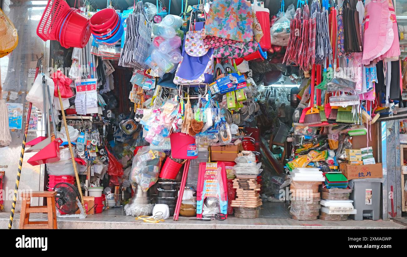 The outdoor Hong Kong traditional market shop front sells home tools ...