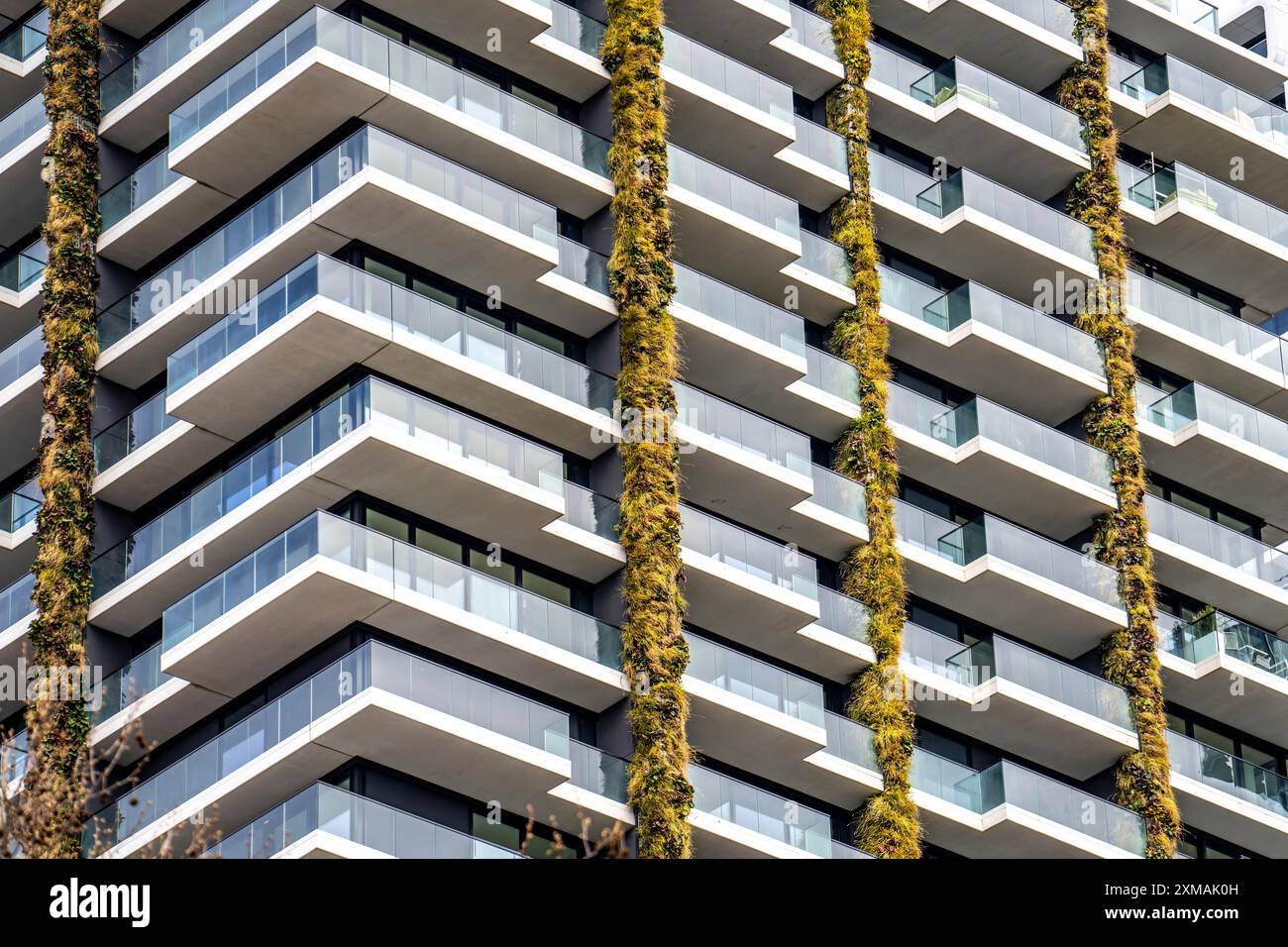 Facade of the Eden Tower on Europa-Allee in Frankfurt am Main, green ...