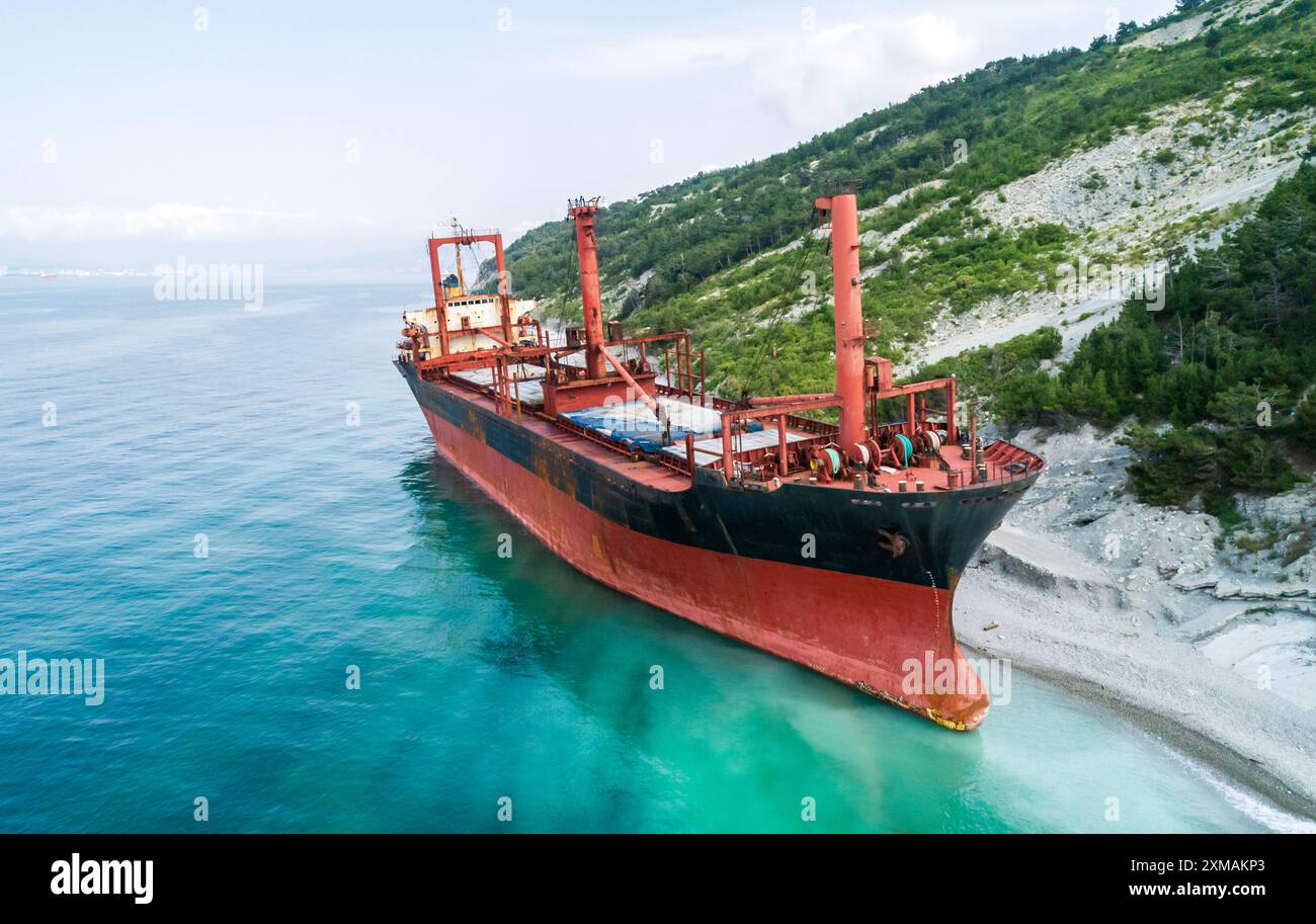 Aerial view of an abandoned bulk-carrier dry cargo ship washed ashore ...