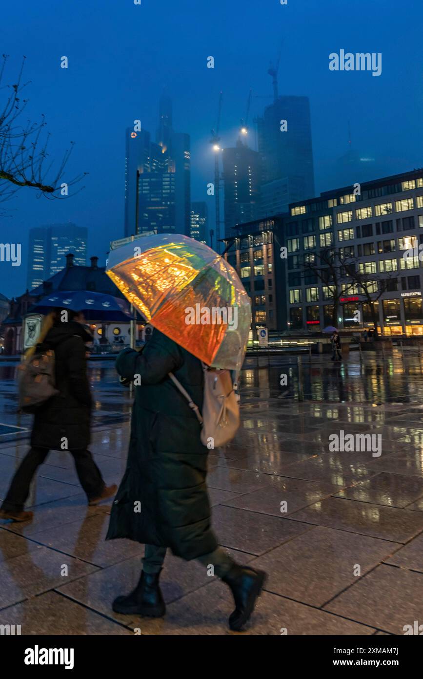 Rainy weather, freezing rain, pedestrian zone Zeil, shopping street ...
