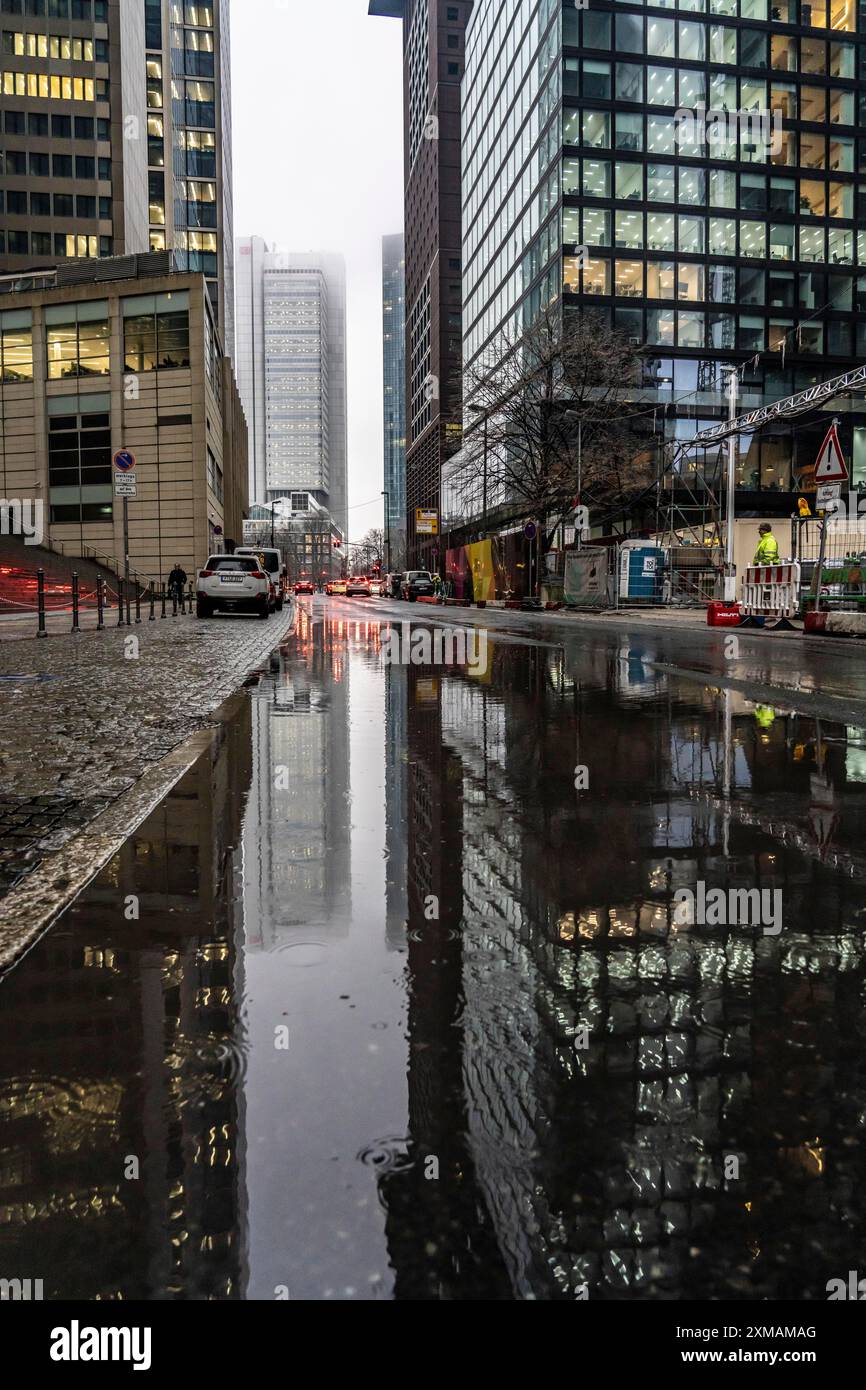 Winter, rainy weather, freezing rain, large puddle, puddle of water, in ...