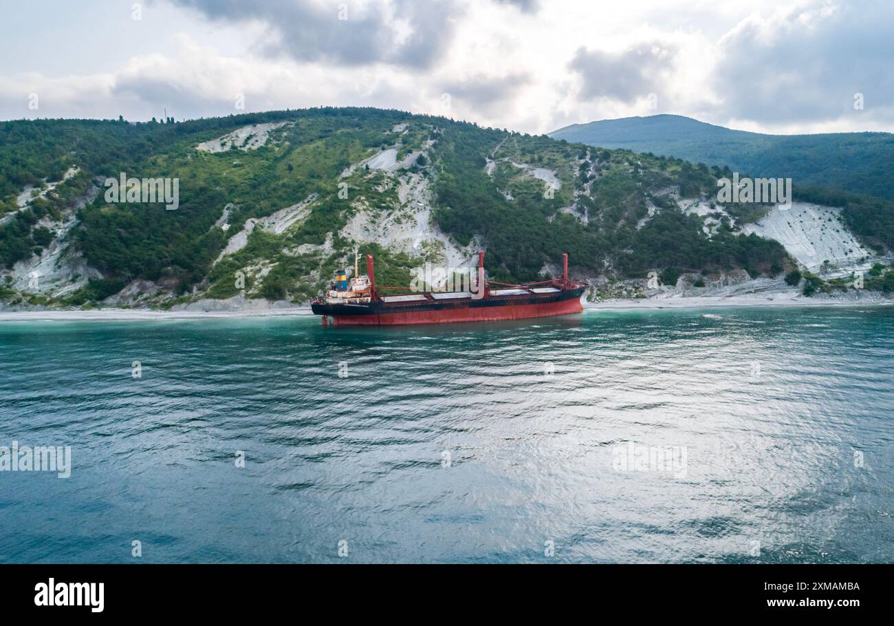 Aerial view of an abandoned bulk-carrier dry cargo ship washed ashore ...