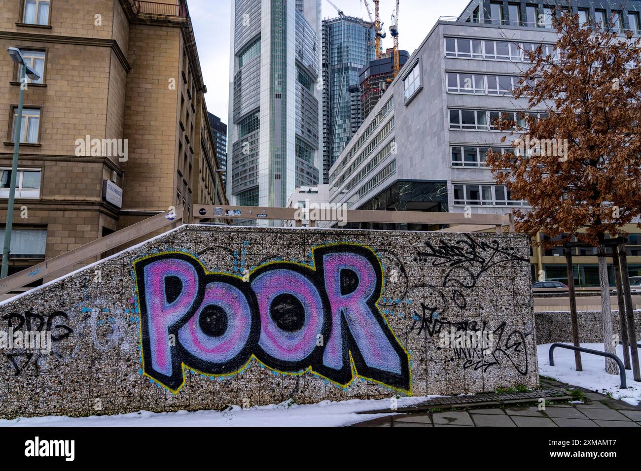 Winter in Frankfurt, view of the city skyline, graffiti on a wall at ...