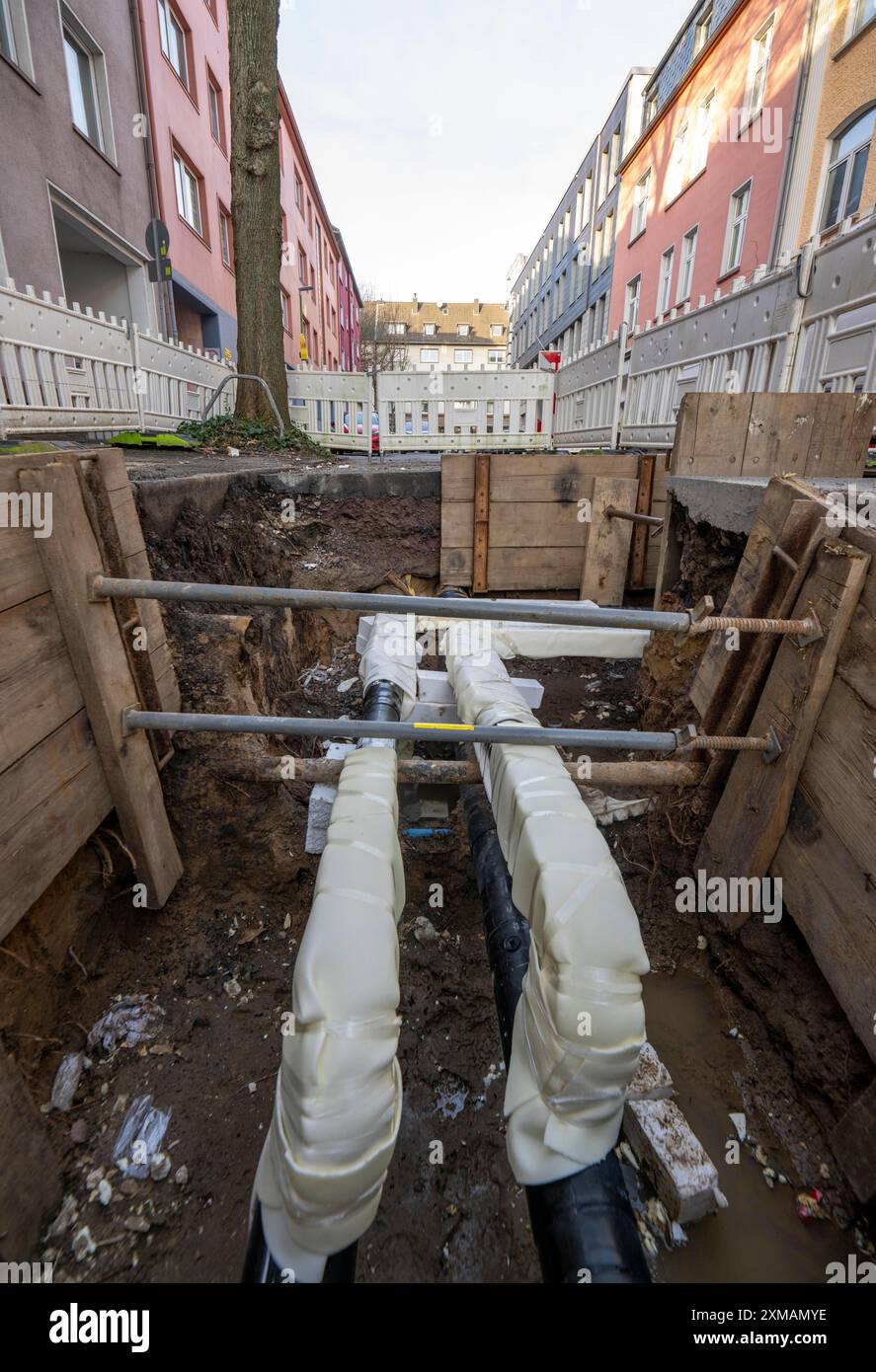 Construction site of a district heating house connection, pipes ...