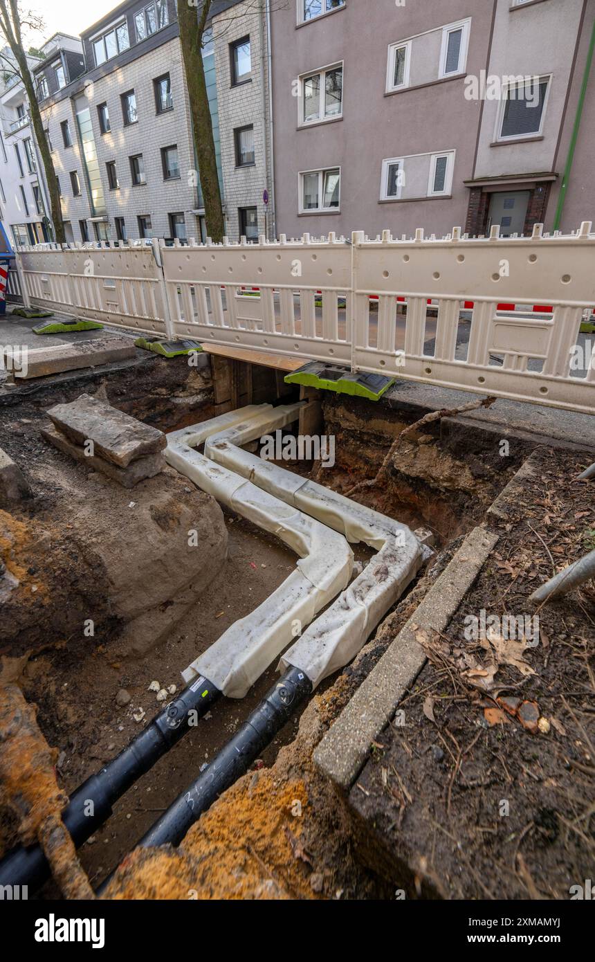 Construction site of a district heating house connection, pipes ...