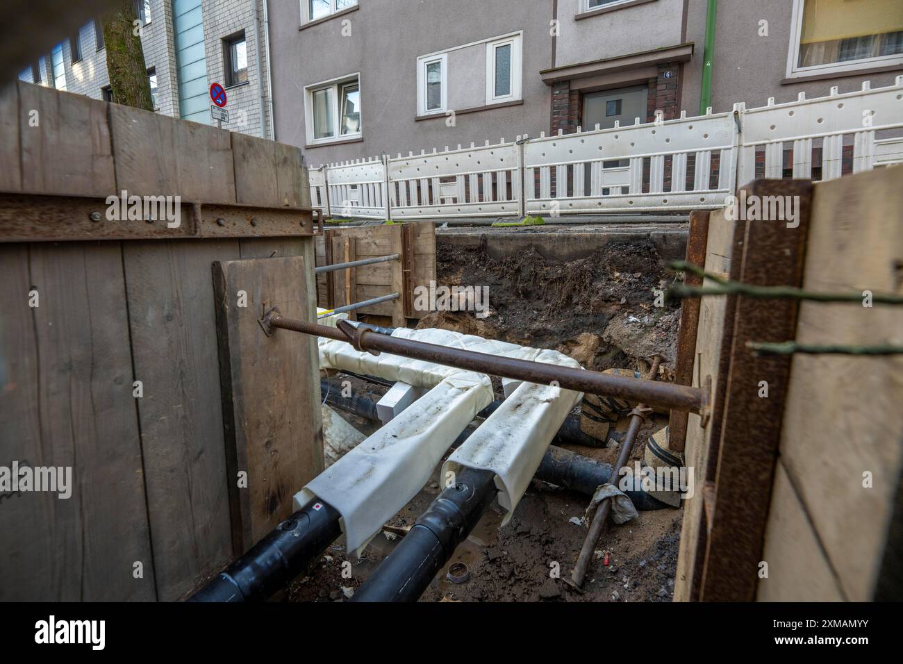 Construction site of a district heating house connection, pipes ...