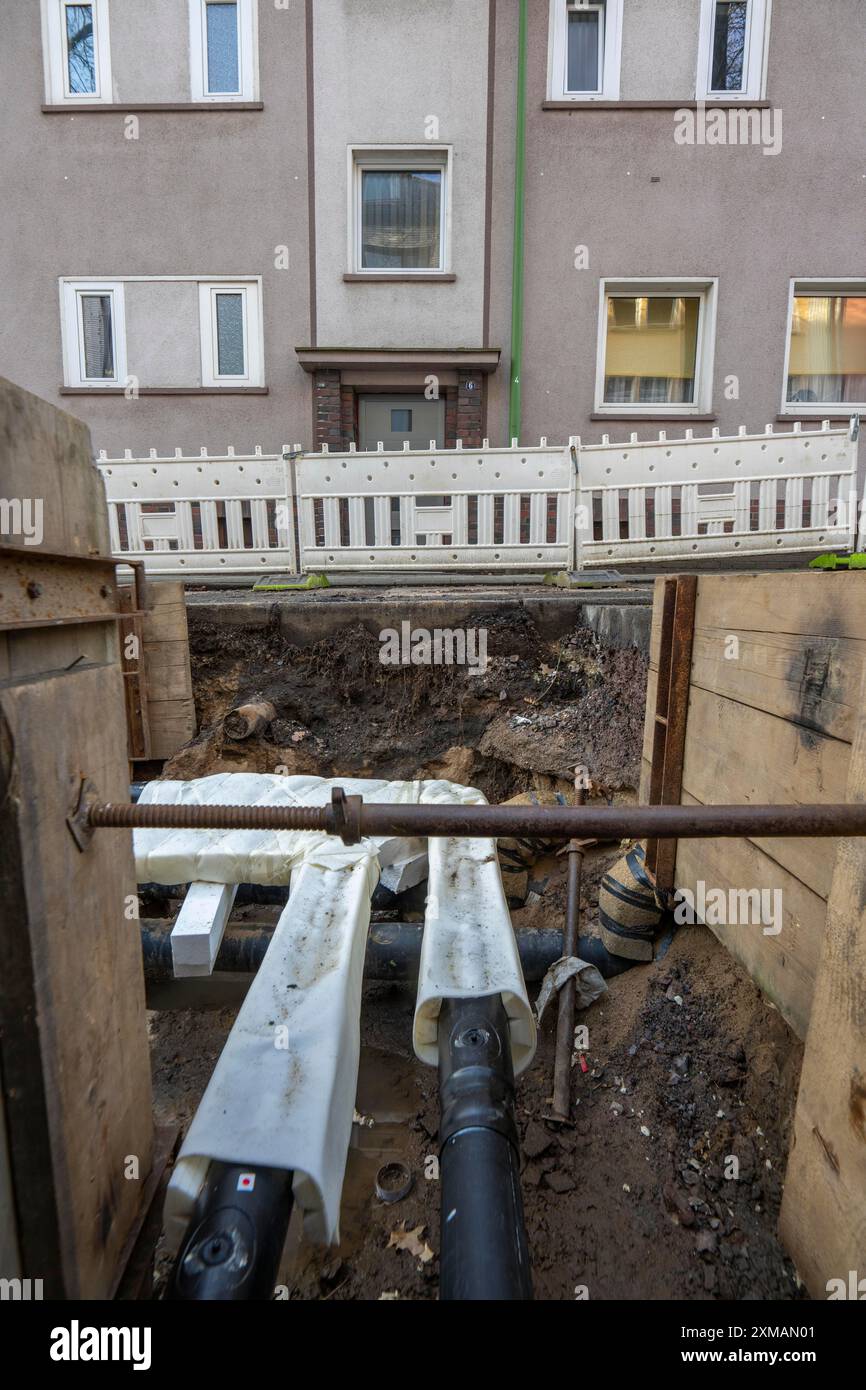 Construction site of a district heating house connection, pipes ...