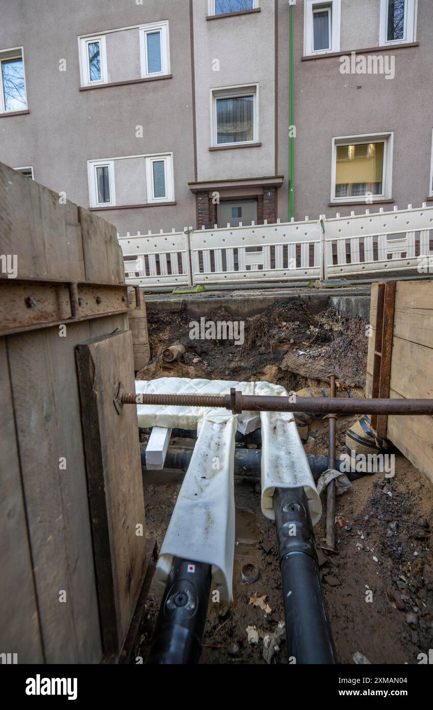 Construction site of a district heating house connection, pipes ...