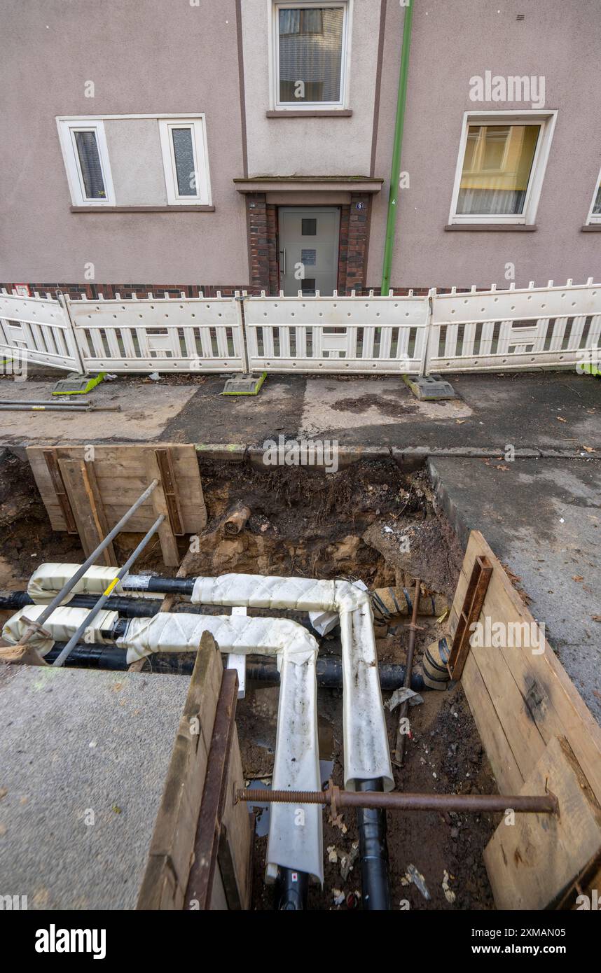 Construction site of a district heating house connection, pipes ...